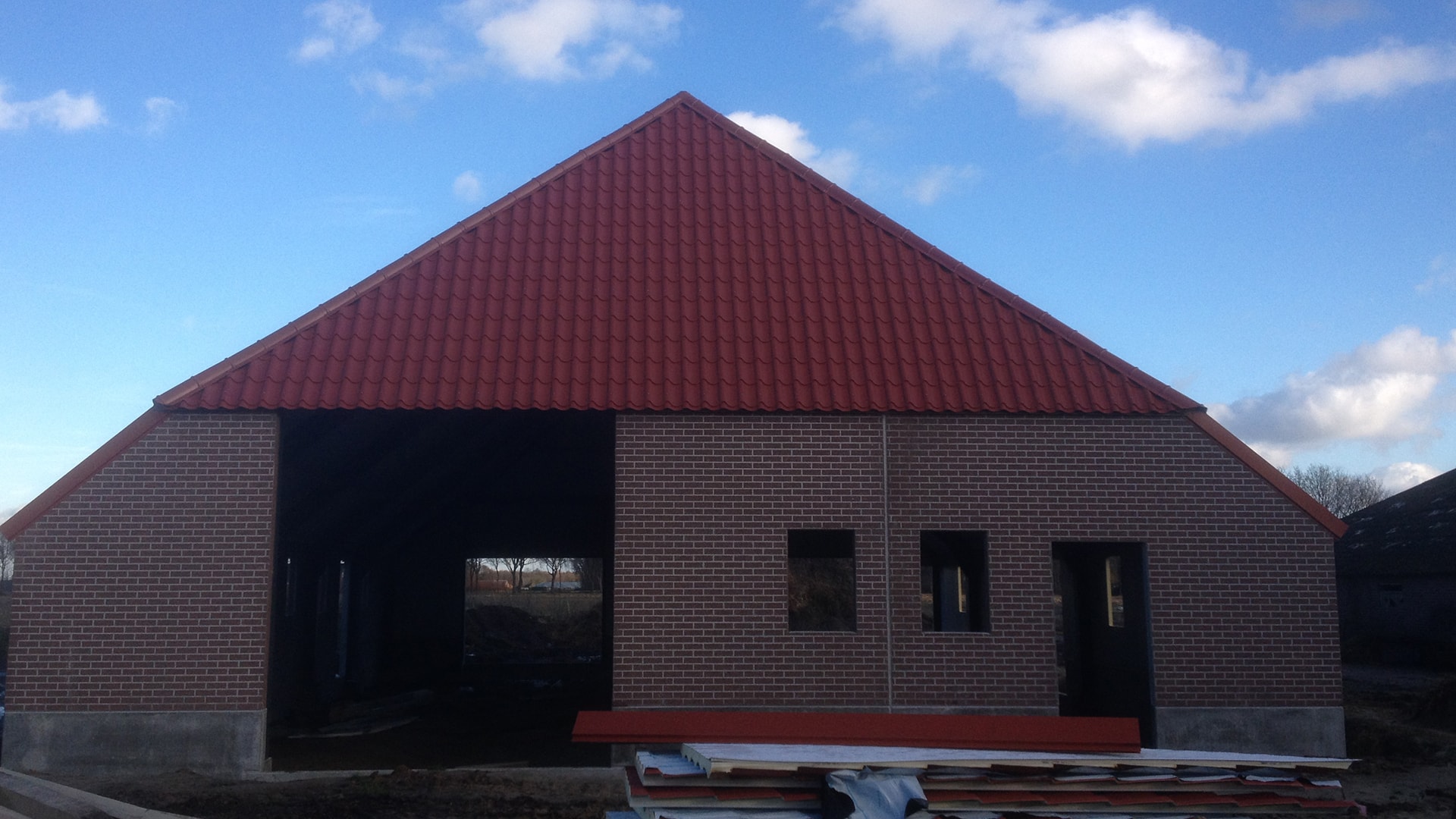 Dakpanplaten kopen? Stalen en geïsoleerde platen | Huisman Gemert